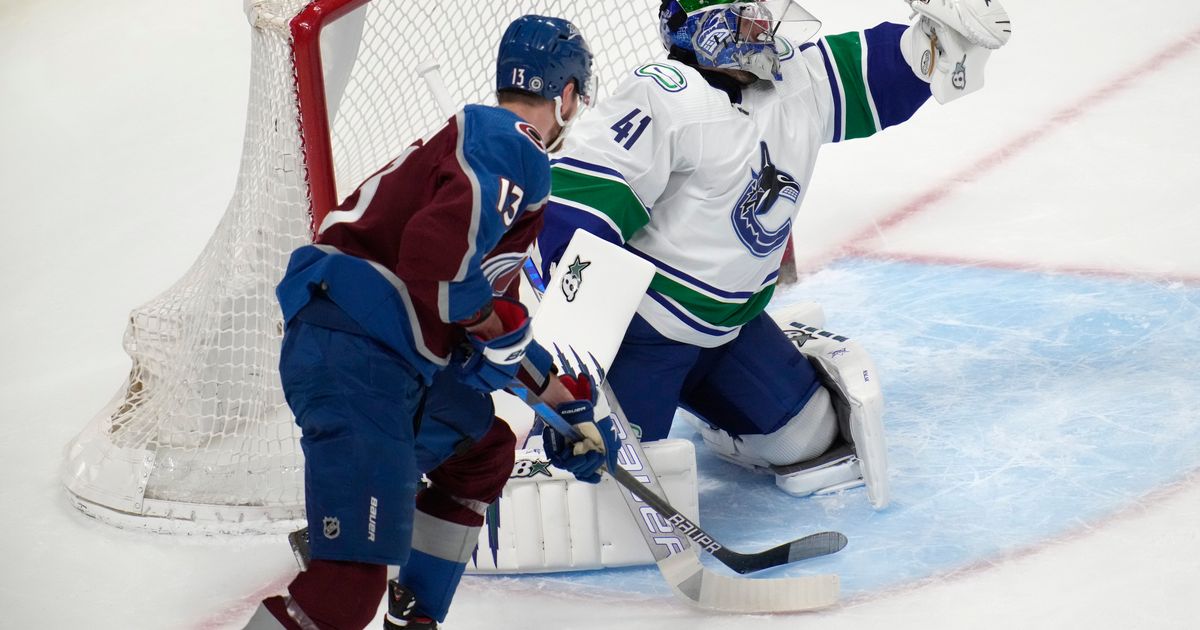 Halak, Canucks contain high-flying Avalanche in 3-1 win | The Seattle Times