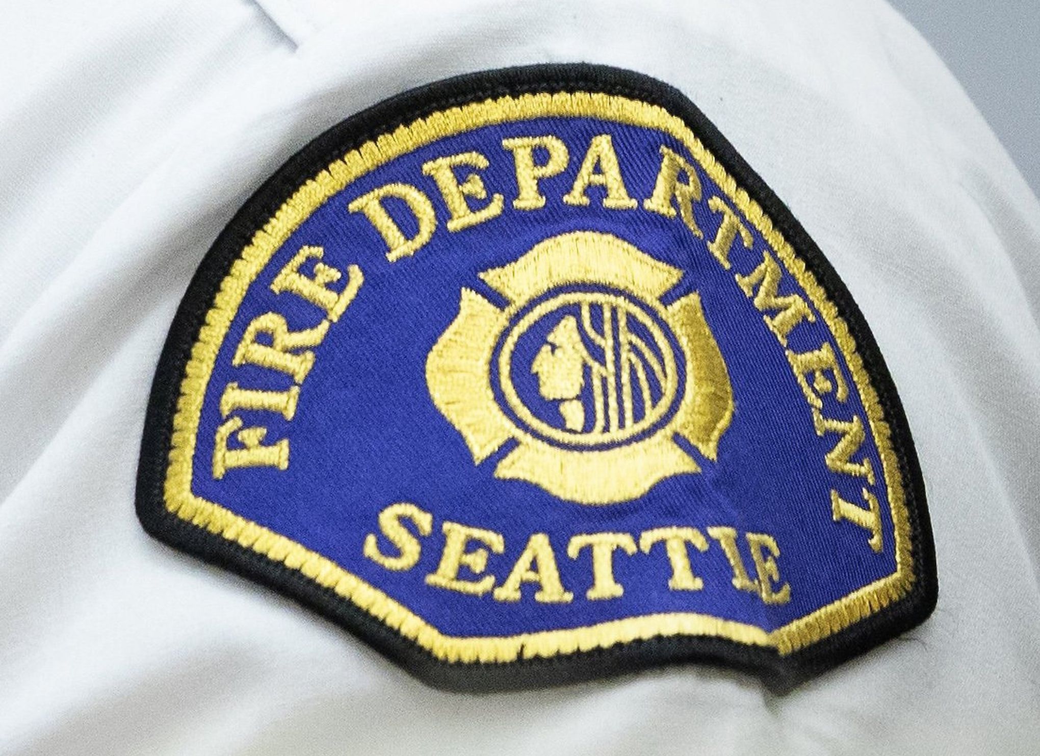 Seattle Fire Department Logo Black Firefighter Sues MA City Over