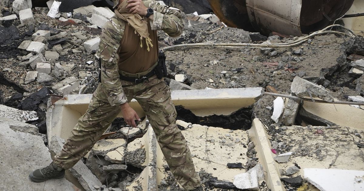 Ukrainian army leaving battered city for fortified positions | The ...