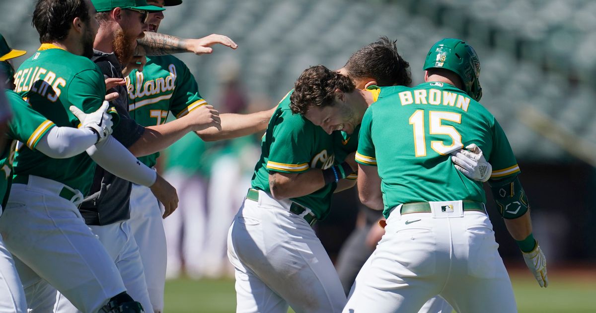 Bolt hits leadoff sacrifice fly in 10th, A’s beat Marlins | The Seattle ...