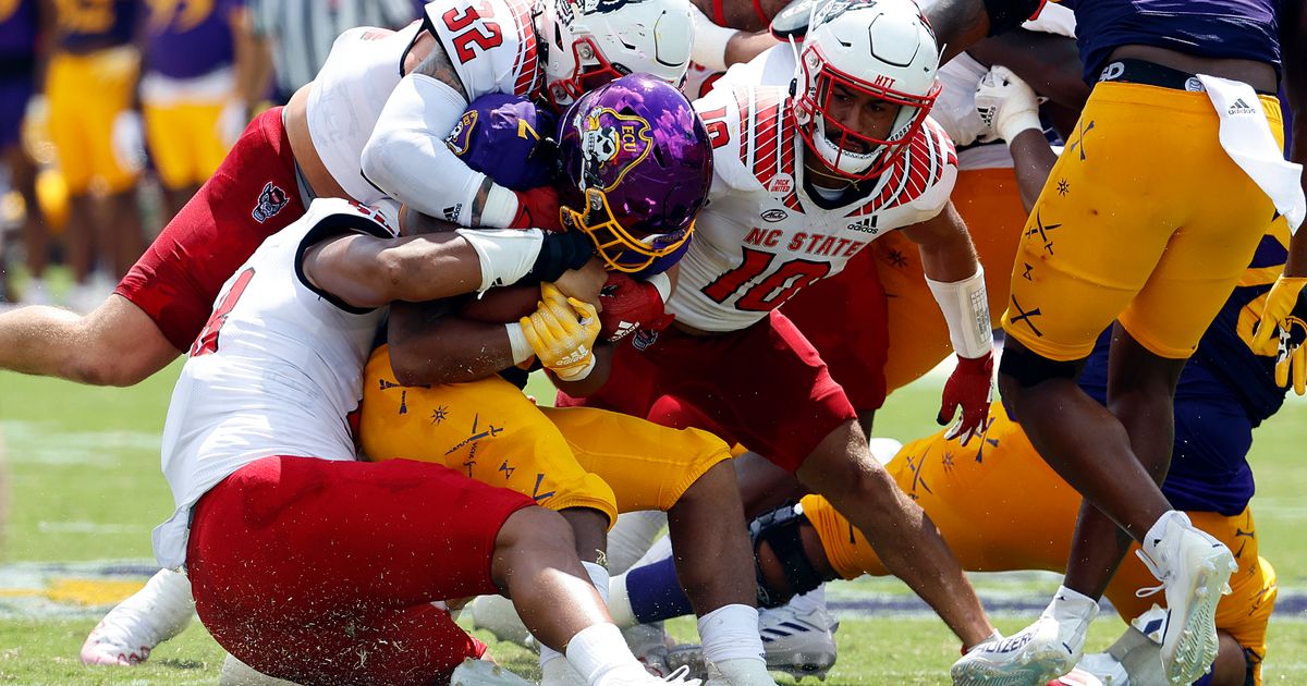No. 13 NC State hangs on to win at ECU after missed kicks | The Seattle ...