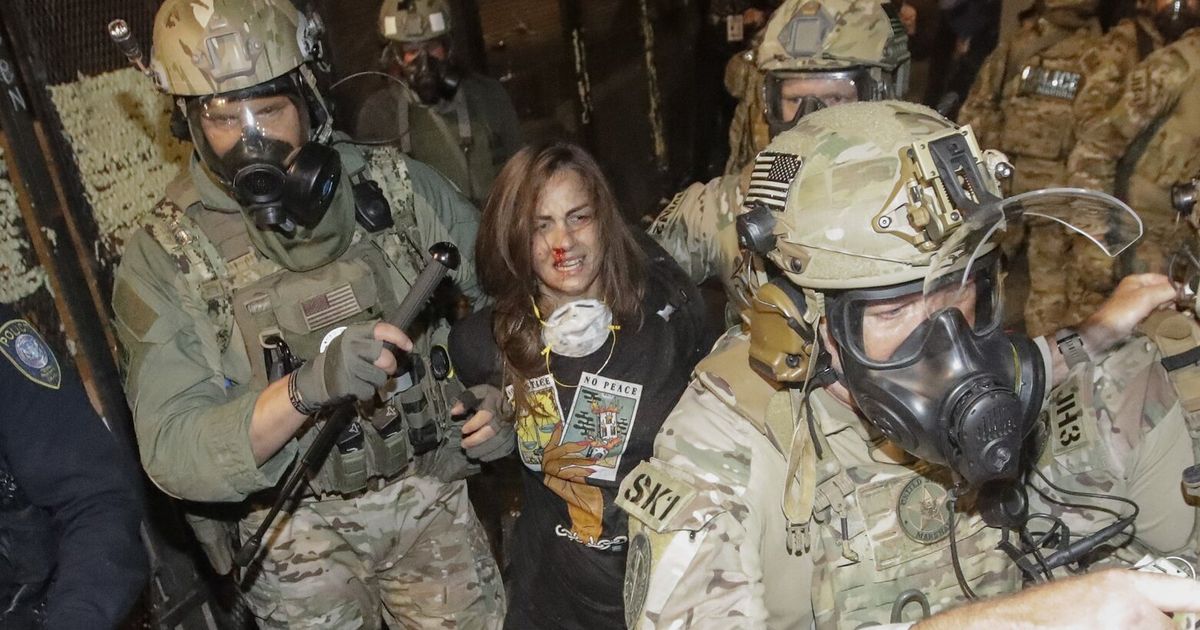 Report shows feds gathered intel on Portland protesters | The Seattle Times