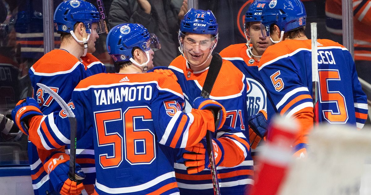 Stone, Kadri lead Flames to 4-3 win over Oilers | The Seattle Times
