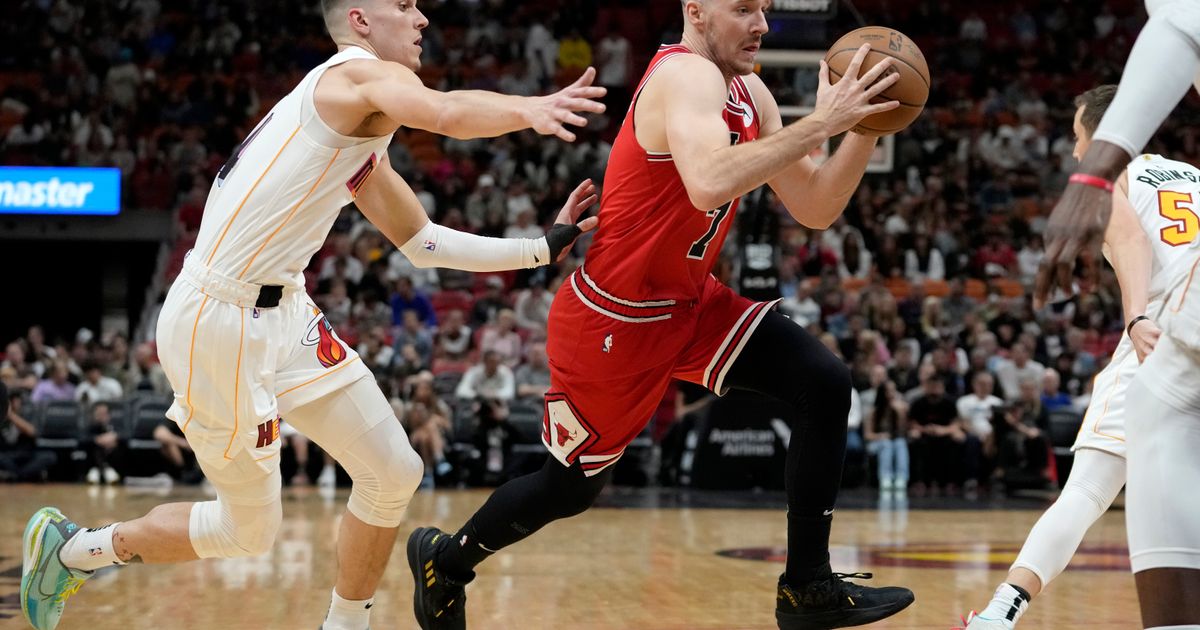 Bulls snap 4-game slide, top short-handed Heat 113-103 | The Seattle Times