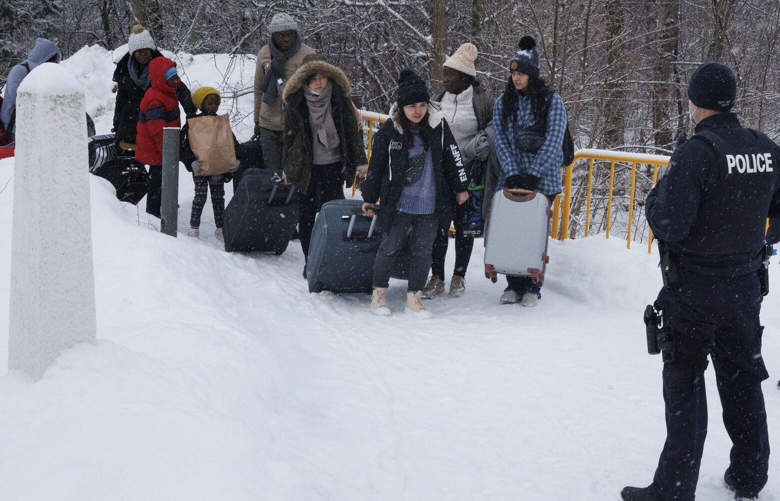 US, Canada end loophole that let asylum-seekers cross border | The ...