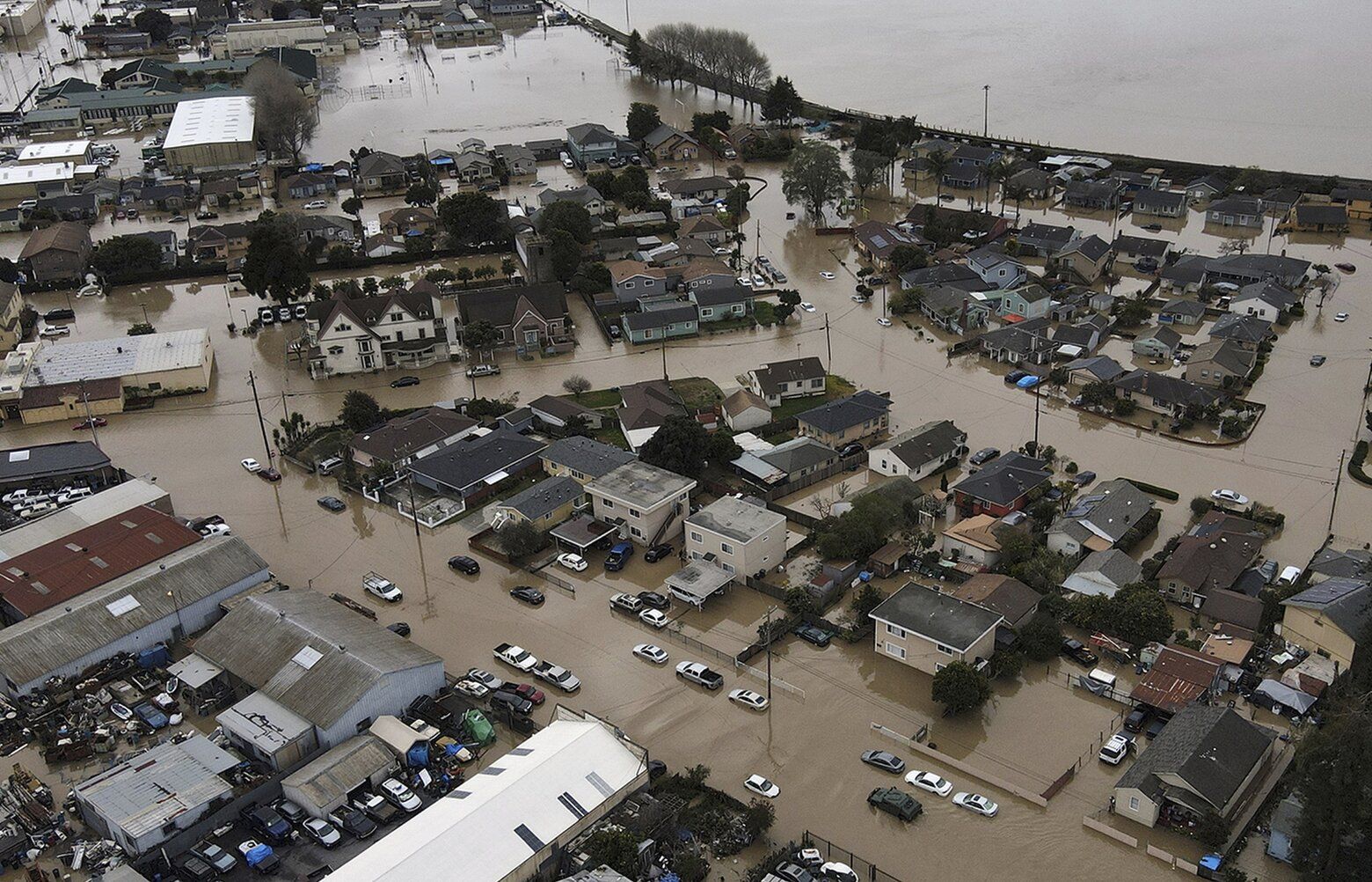 Flood problems grow as new storm moves into California | The Seattle Times