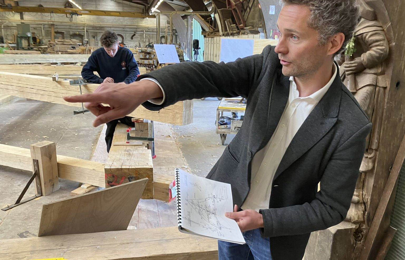 Oak trusses raised to roof of fire-ravaged Notre Dame Cathedral as ...