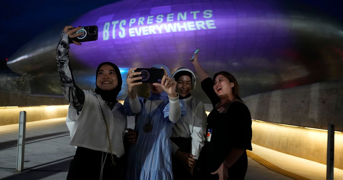 BTS turns 10. Seoul lights up landmarks to celebrate. | The Seattle Times