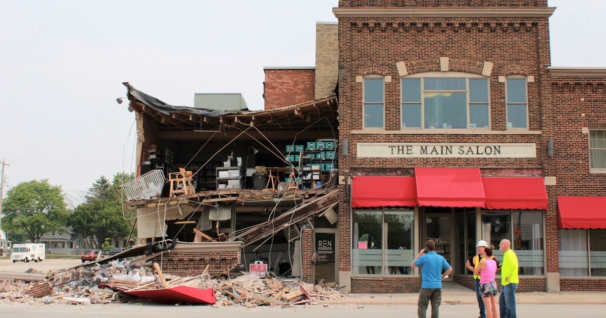 Minivan strikes building, leaving roof sagging and turning much of its ...