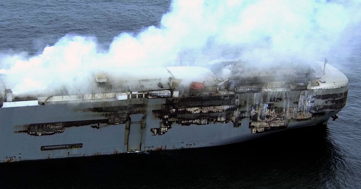 Burning cargo ship off Dutch coast will be towed to a new location ...