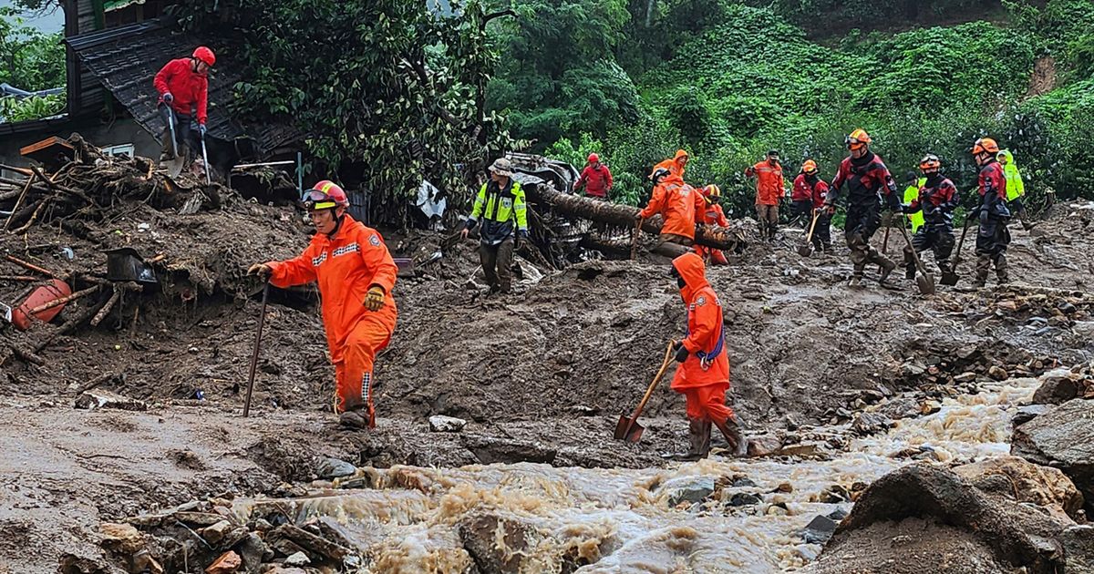 Days of torrential rain in South Korea leave at least 26 dead in ...
