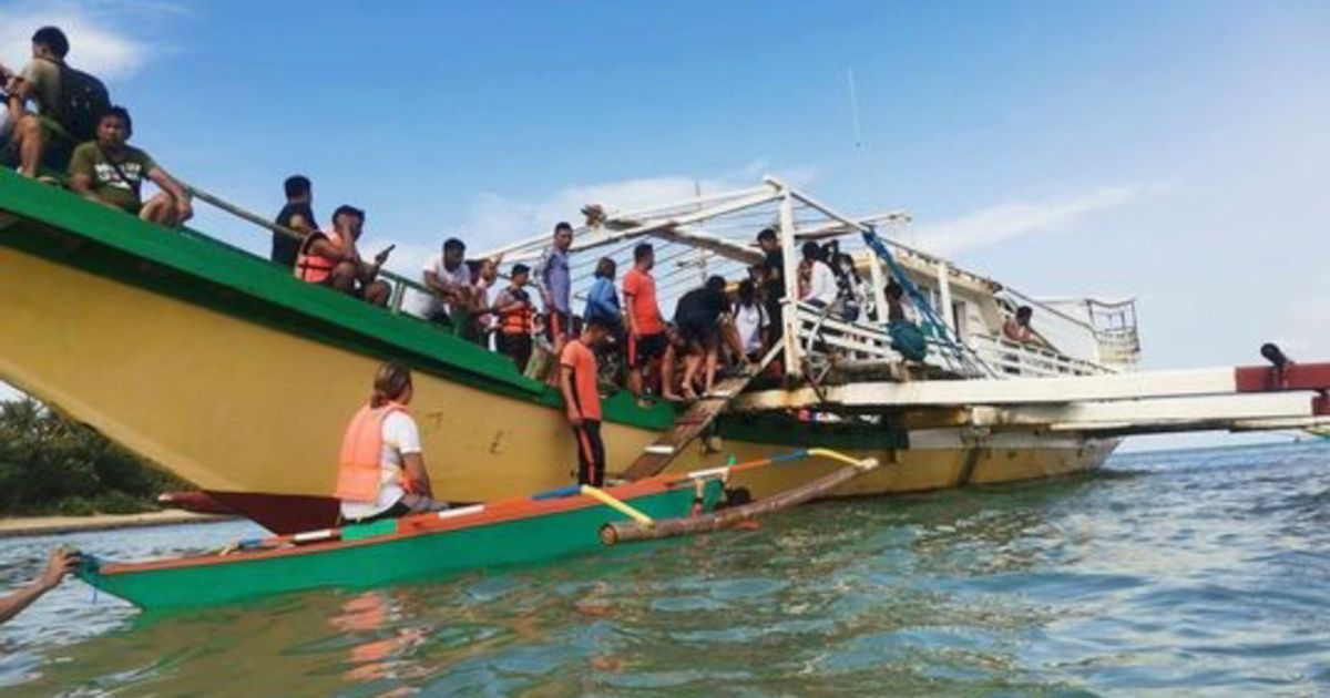 Philippine coast guard rescues 67 people from damaged boat in the ...