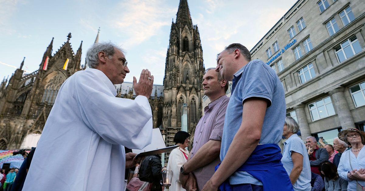 Catholic priests bless same-sex couples in defiance of a German ...