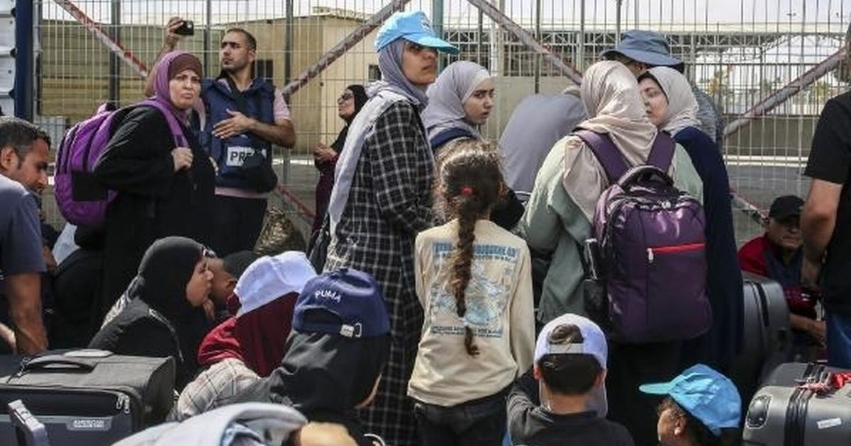 Stranded at a closed border as bombs fall, foreign nationals in ...