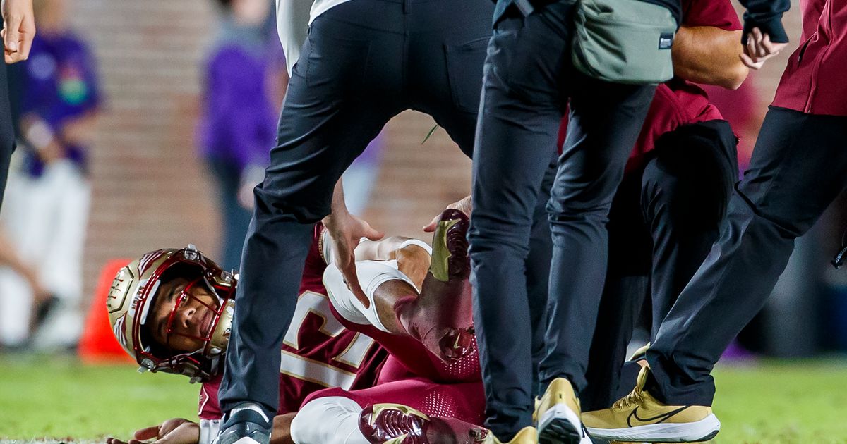 Florida State QB Jordan Travis carted off after injury to left leg ...