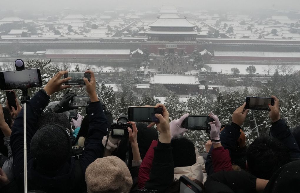 More than 100 injured in a Beijing rail collision as heavy snow hits ...