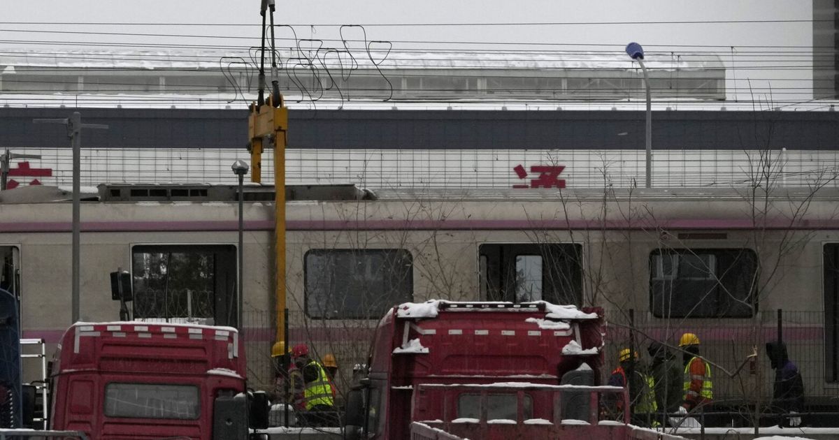More than 100 injured in a Beijing rail collision as heavy snow hits ...