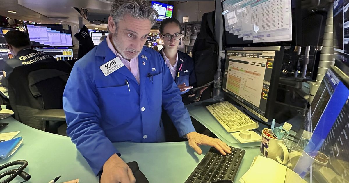 Wall Street hits record high after 2-year round trip scarred by ...