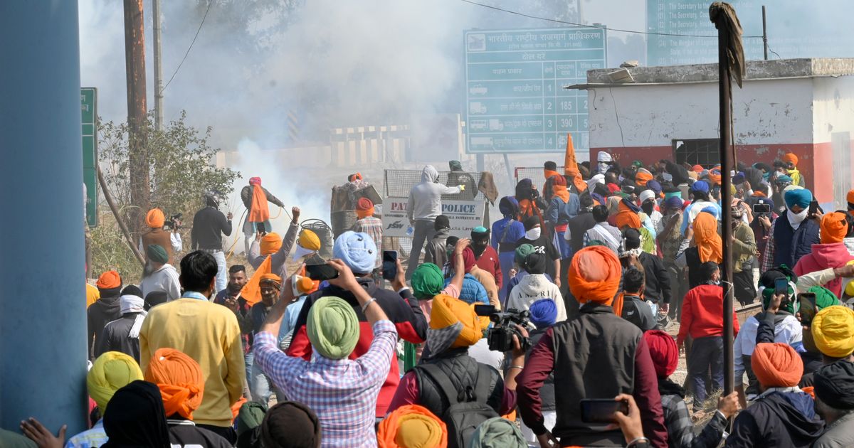 Protesting Indian farmers clash with police for a second day as they ...