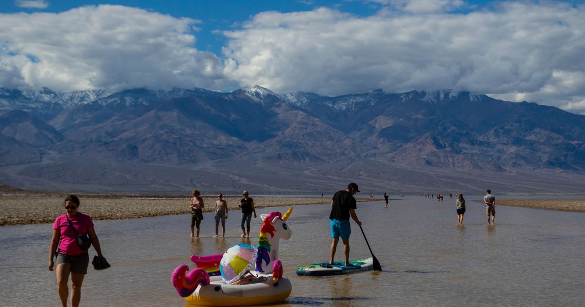 Kayakers paddle in Death Valley after rains replenish lake in one of ...