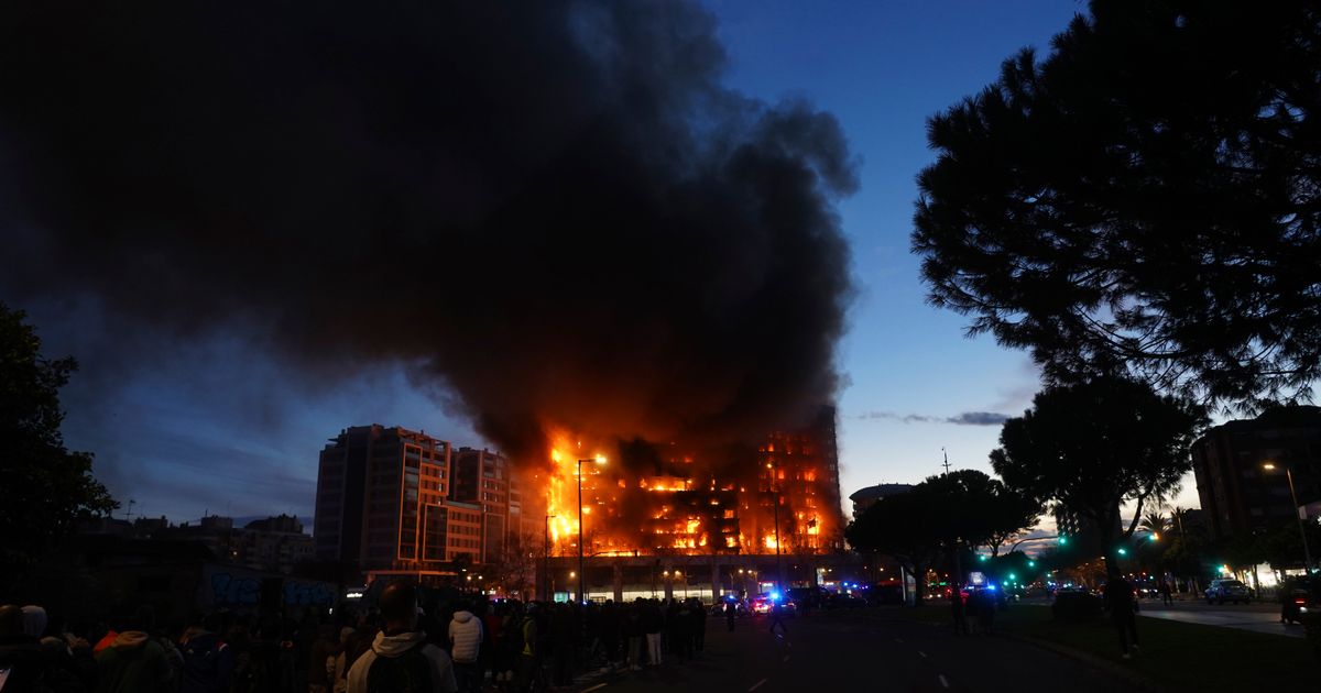 Fire engulfs 2 buildings in Spanish city of Valencia, killing at least ...
