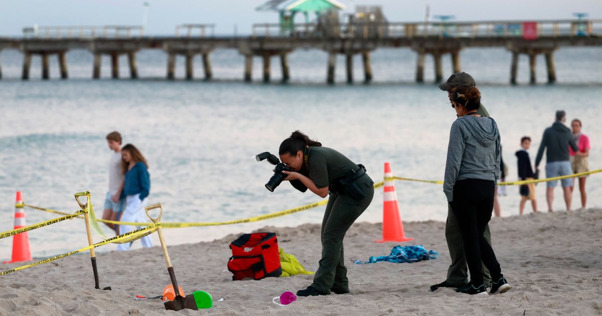 Young girl killed when a hole she dug in the sand collapsed on a ...