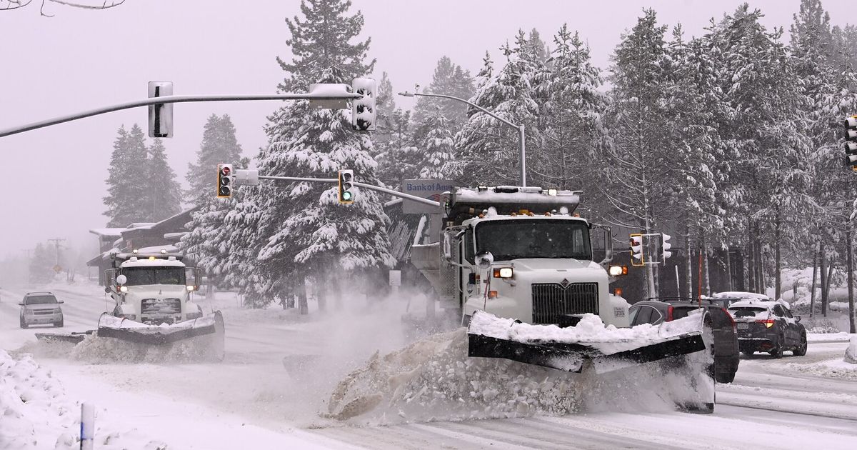 A massive blizzard howls in the Sierra Nevada. High winds and heavy ...