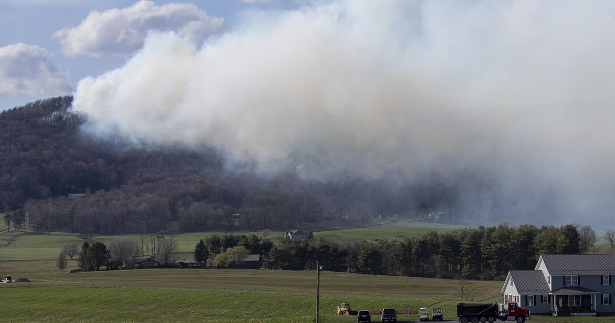 Crews battle scores of wildfires in Virginia, including a blaze in ...