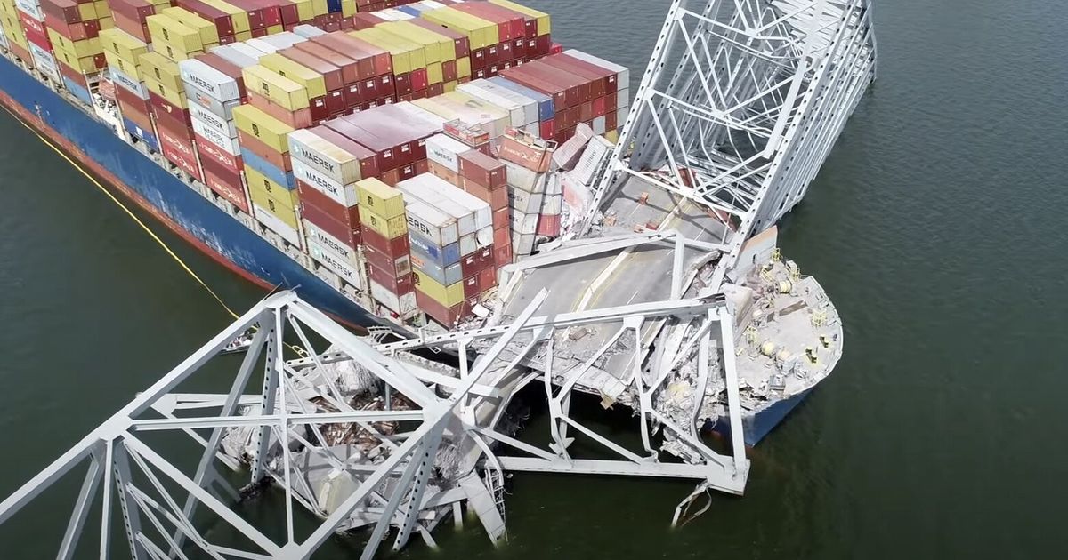 Crews carefully start removing first piece of twisted steel from ...