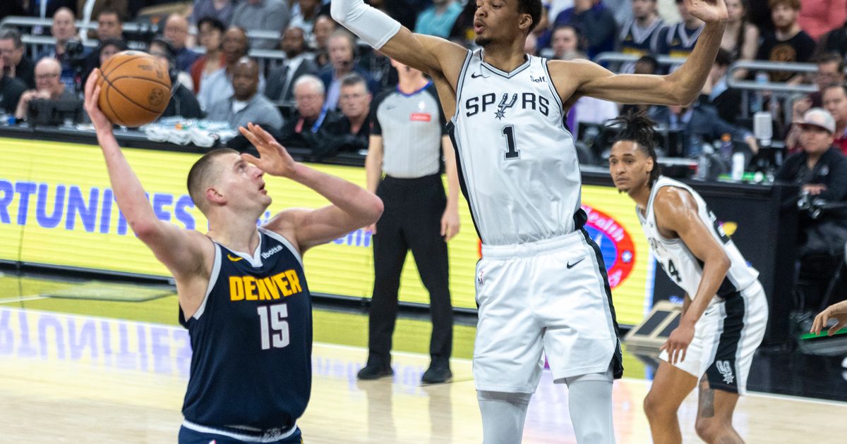 Jokic scores 31, Nuggets top Spurs 117-106 in front of record crowd in ...