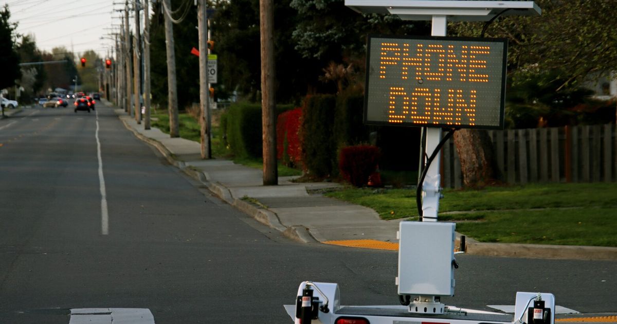 New traffic signs may catch you looking at your phone | The Seattle Times