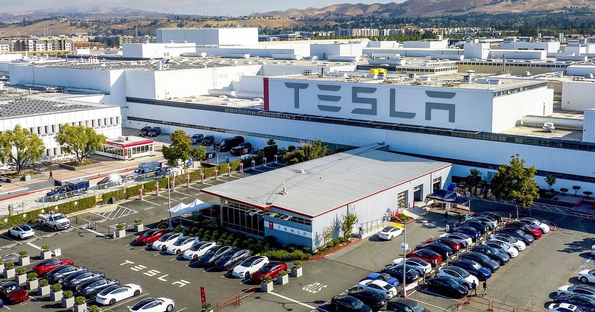 Tesla to cut over 10% of workforce as EV demand cools | The Seattle Times