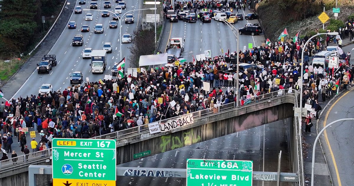 6 people charged in cease-fire protest that blocked I-5 | The Seattle Times