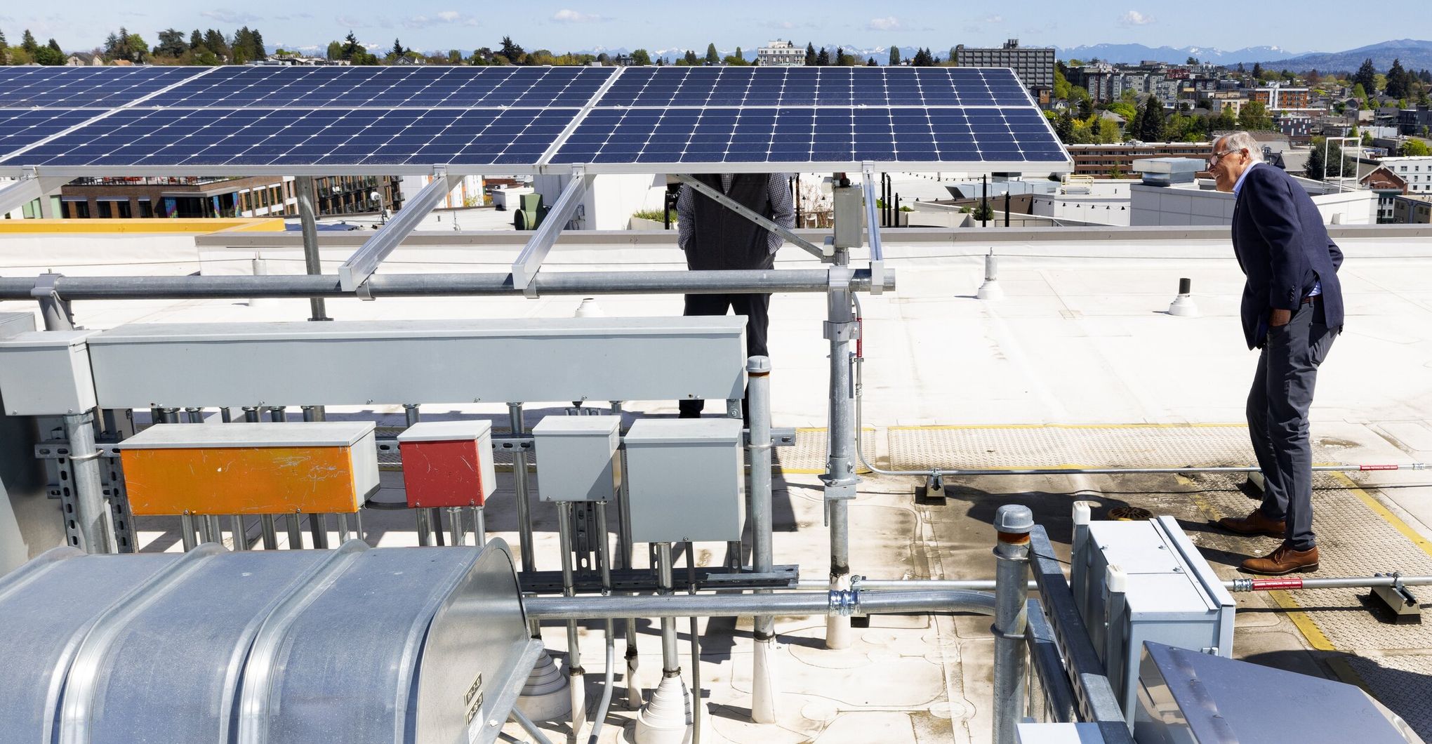 Solar Panels Being Installed On A Commercial Building In Washington D
