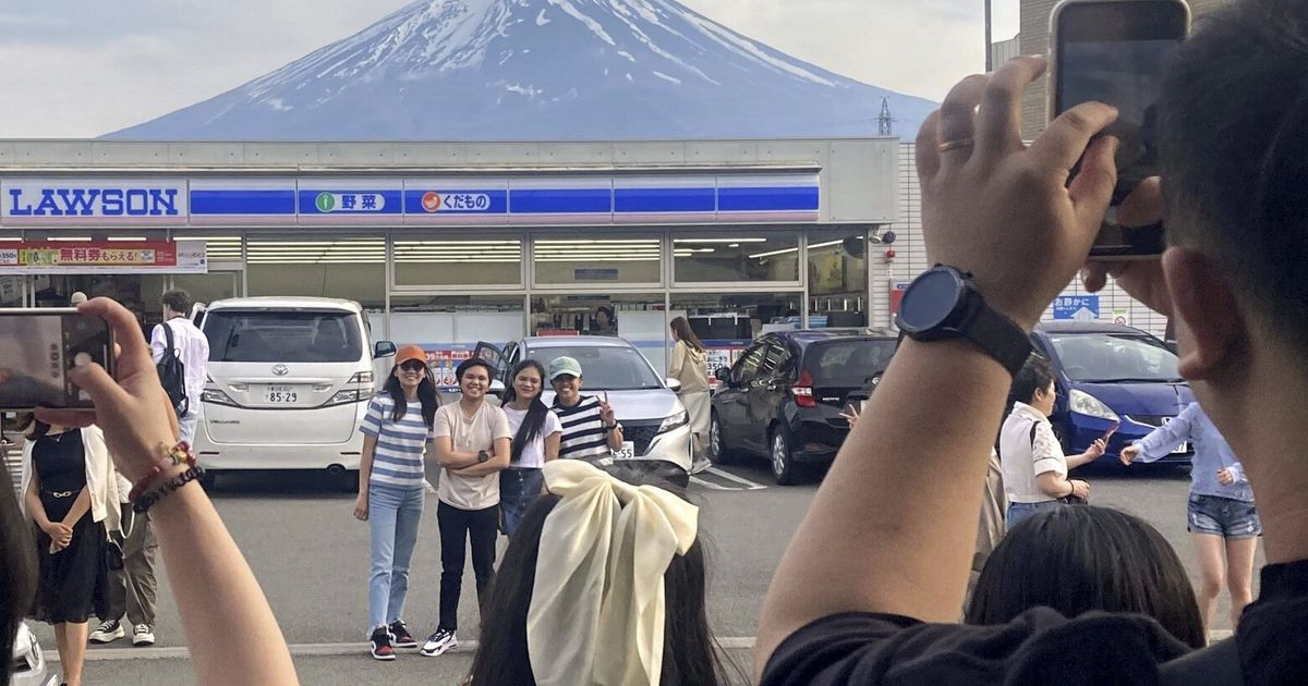 To fend off tourists, a town in Japan is building a big screen blocking ...