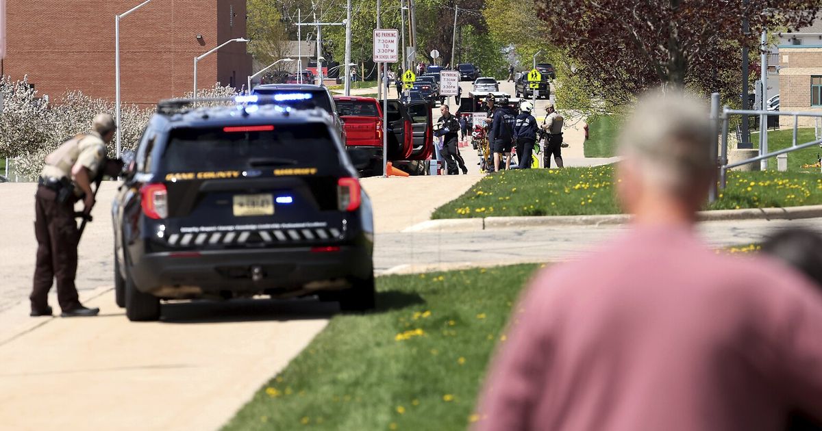 Investigators say student killed by police outside Wisconsin school had ...