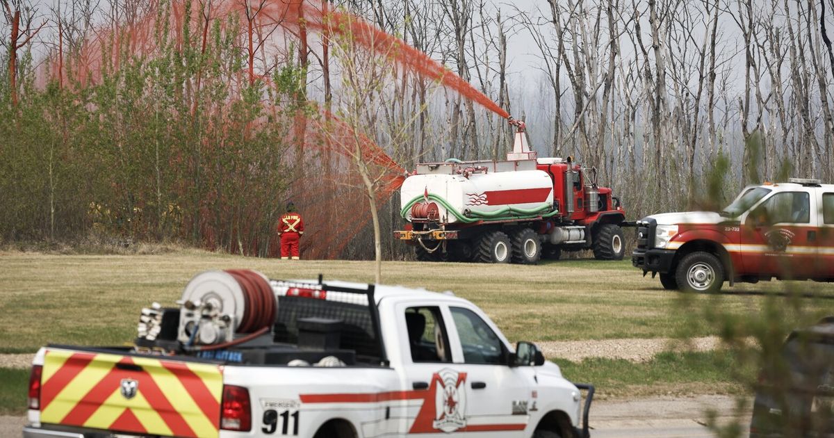 Fire threat eases near Canada’s oil sands hub, but a long, hot summer ...