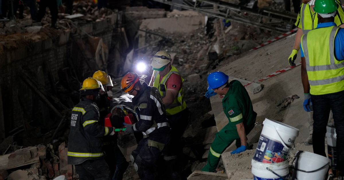Survivors rescued but dozens still trapped after a deadly building ...