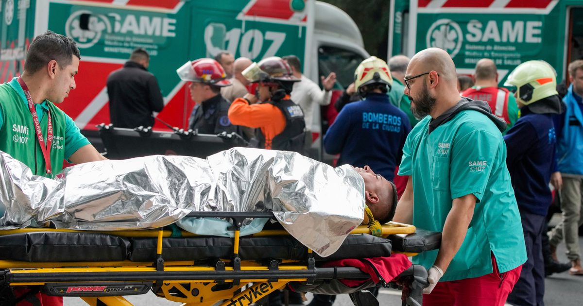 A train in central Buenos Aires strikes a boxcar on the track, injuring ...