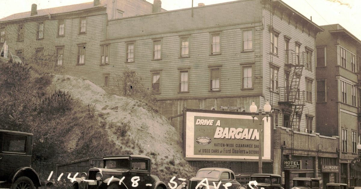 This Seattle billboard shifted gears between its 1937 and 1957 auto ads ...