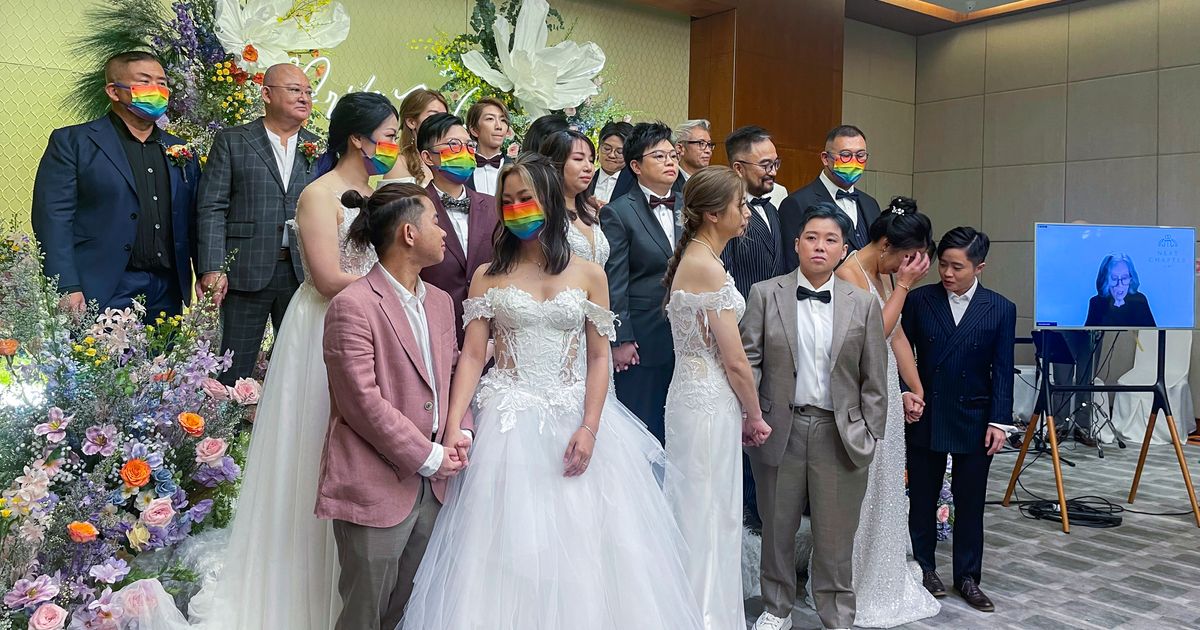 A US officiant marries 10 same-sex couples in Hong Kong via video chat | The Seattle Times