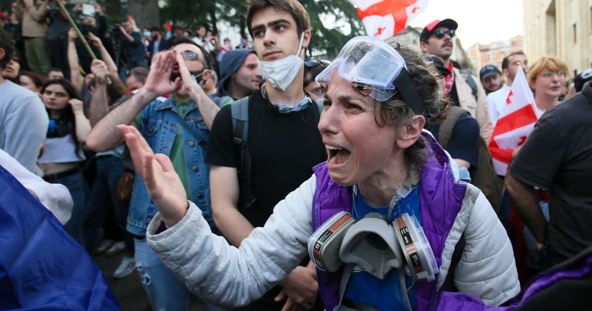 Parliament speaker in Georgia signs into law a bill that critics say ...