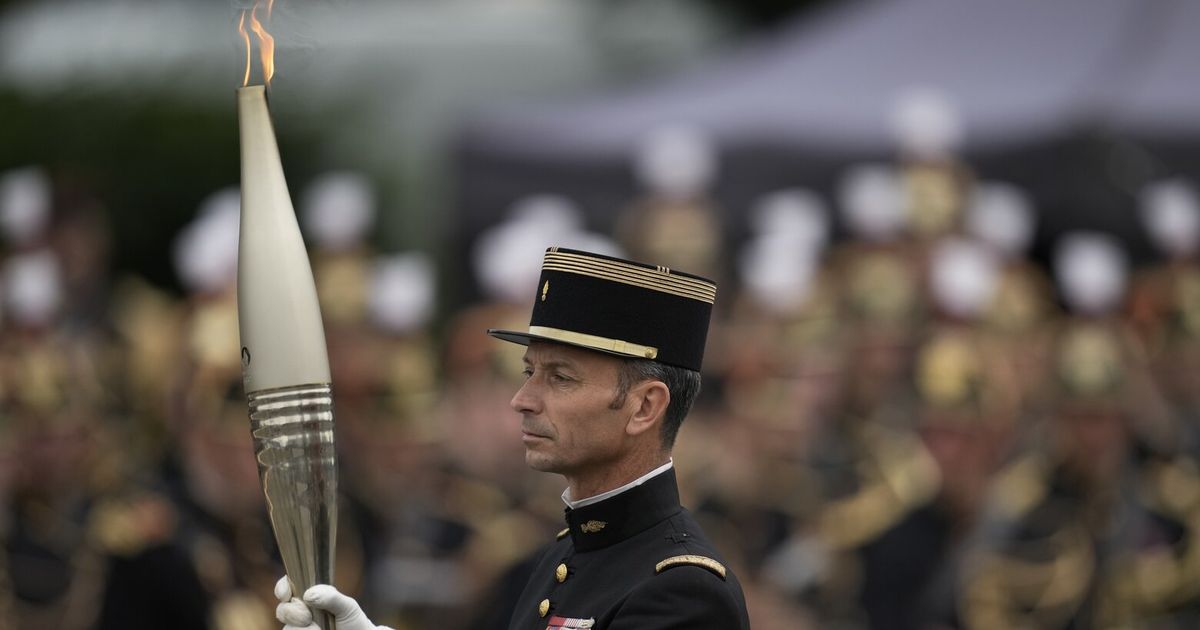 France’s Bastille Day parade meets the Olympic torch relay in an ...