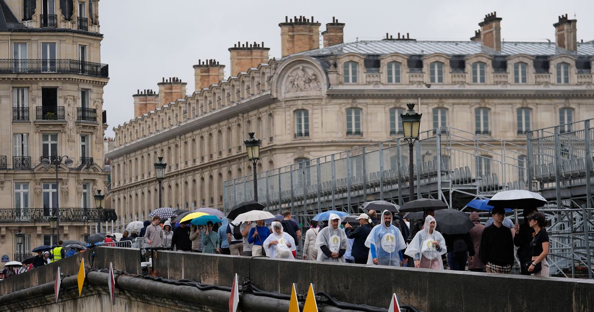 Paris barricades start to come down after opening ceremony on the Seine ...