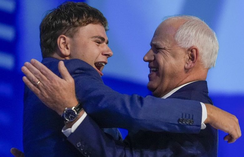 ‘That’s my dad!’: Gus Walz tearfully cheers on his father as he accepts ...