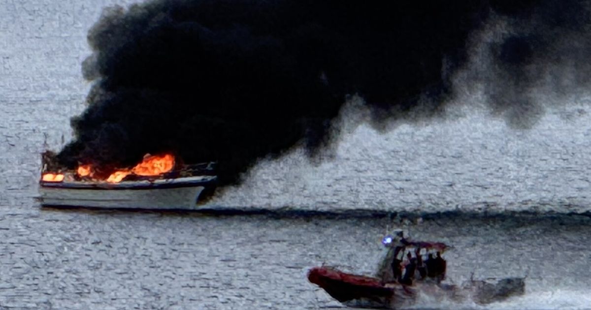 Boater rescued as 40-foot vessel burns offshore near West Seattle | The ...