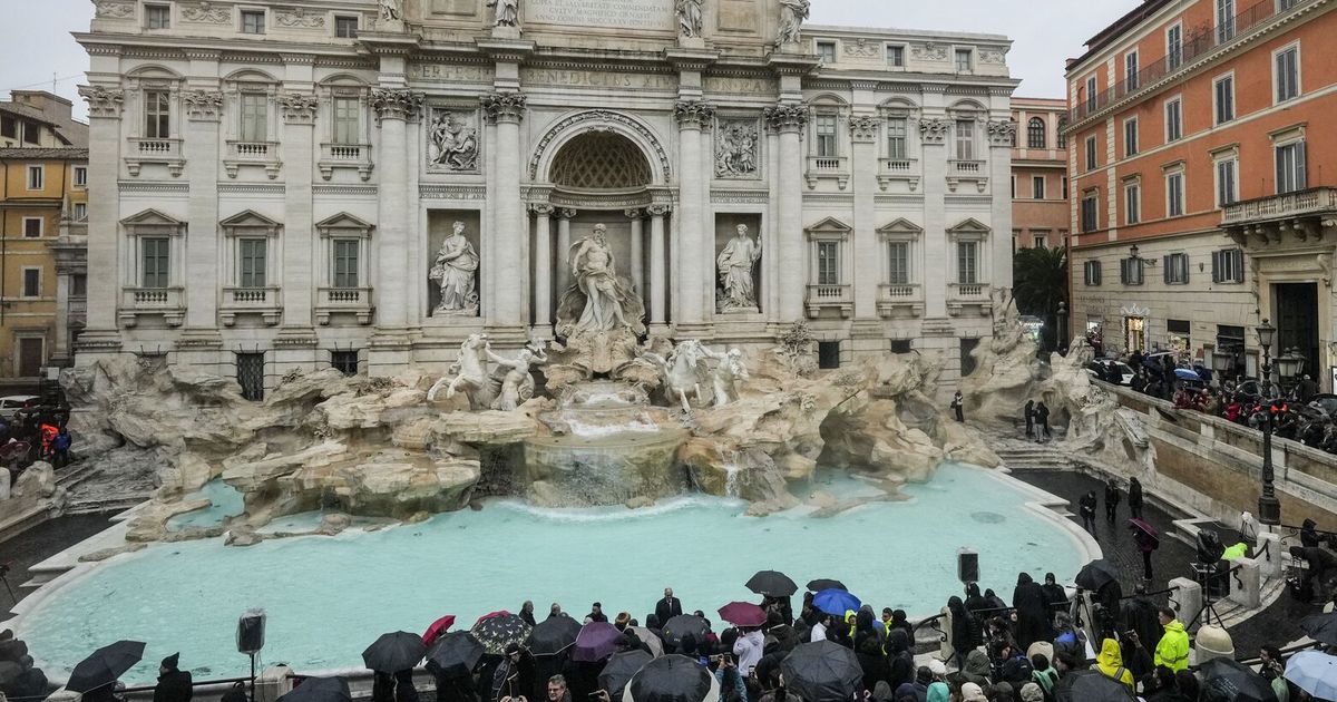 Rome’s iconic Trevi Fountain reopens after renovation work in time for ...