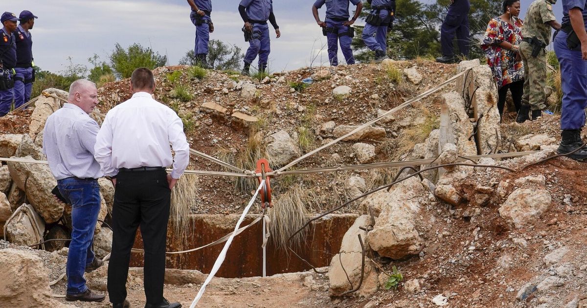 At least 100 illegal miners have died while trapped in a South African ...