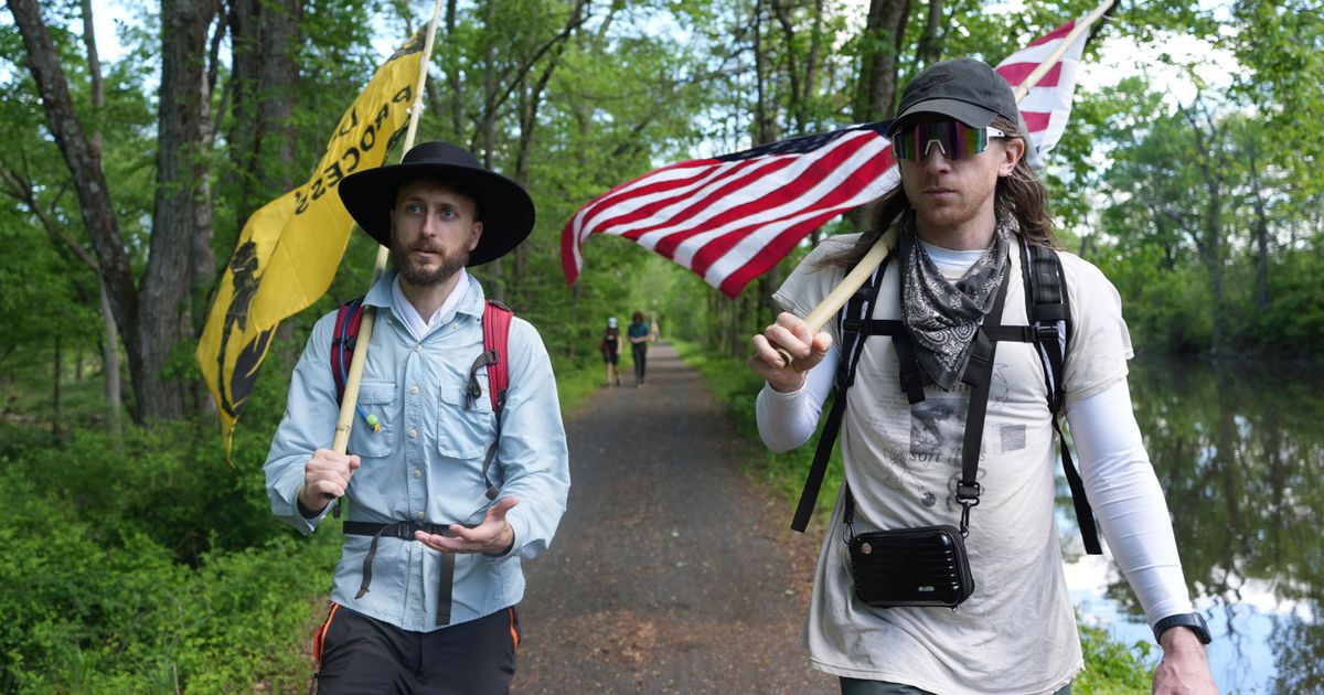 Quakers march against Trump’s crackdown on immigrants carrying on their ...