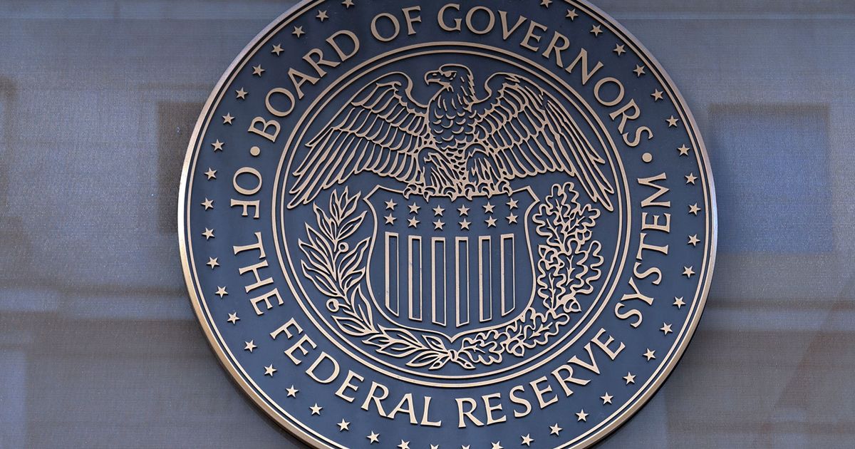 Federal Reserve official sees signs of slowing economy but not ready to ...